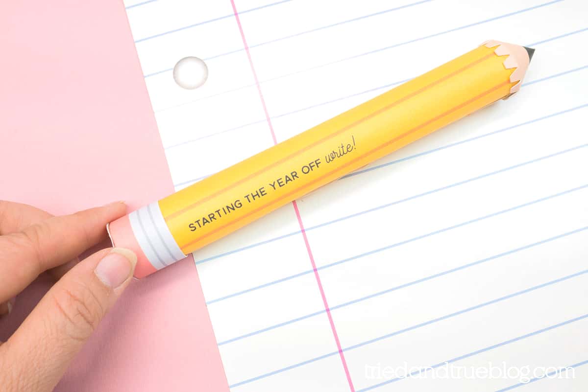 Pencil Writing Words On Paper